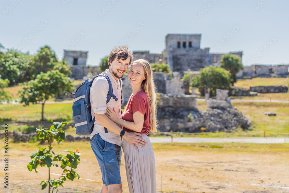 Couple man and woman tourists enjoying the view Pre-Columbian Mayan ...
