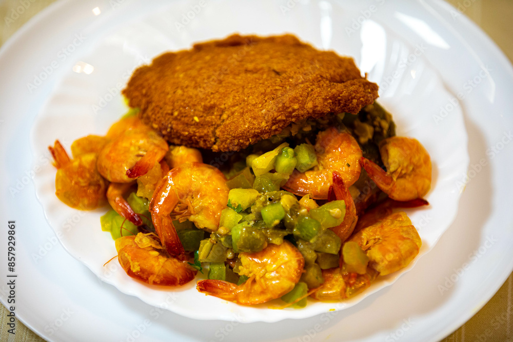 Traditional Brazilian acarajé, food of African origin based on vatapá, caruru and dry shrimp ...