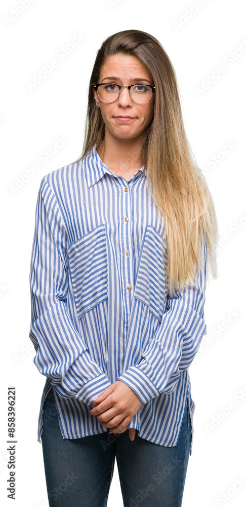 Beautiful young woman wearing elegant shirt and glasses depressed and ...