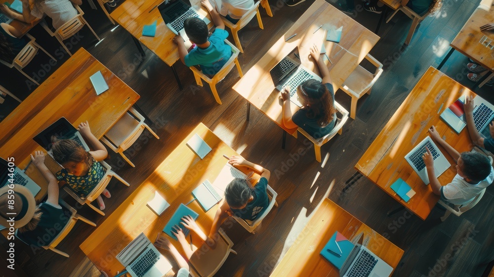 The image shows a group of diverse students studying and working ...