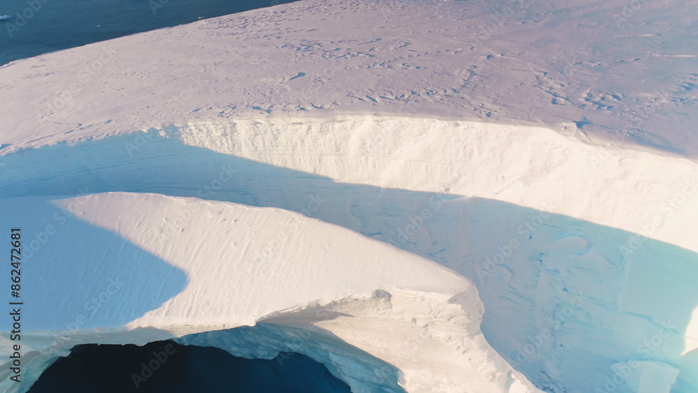 Cracked ice, huge break Arctic glacier aerial view. Iceberg deep ...
