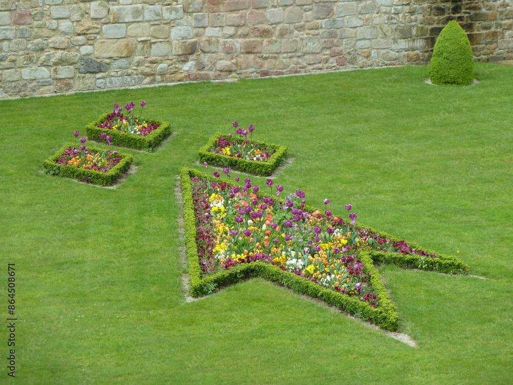 flower bed in the shape of an heraldry ermine on a lawn in Brittany ...