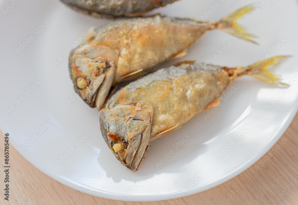 fried asian mackerel on white dish, thai food culture, pla too, fried ...