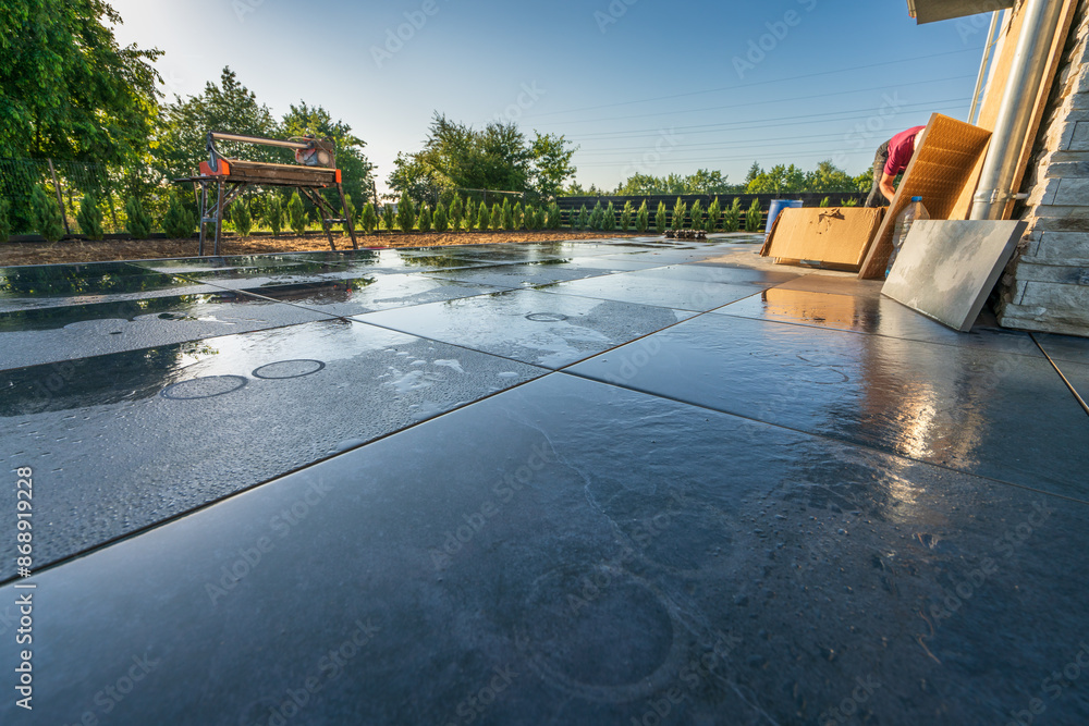 Ceramic terrace tiles on adjustable supports under construction ...