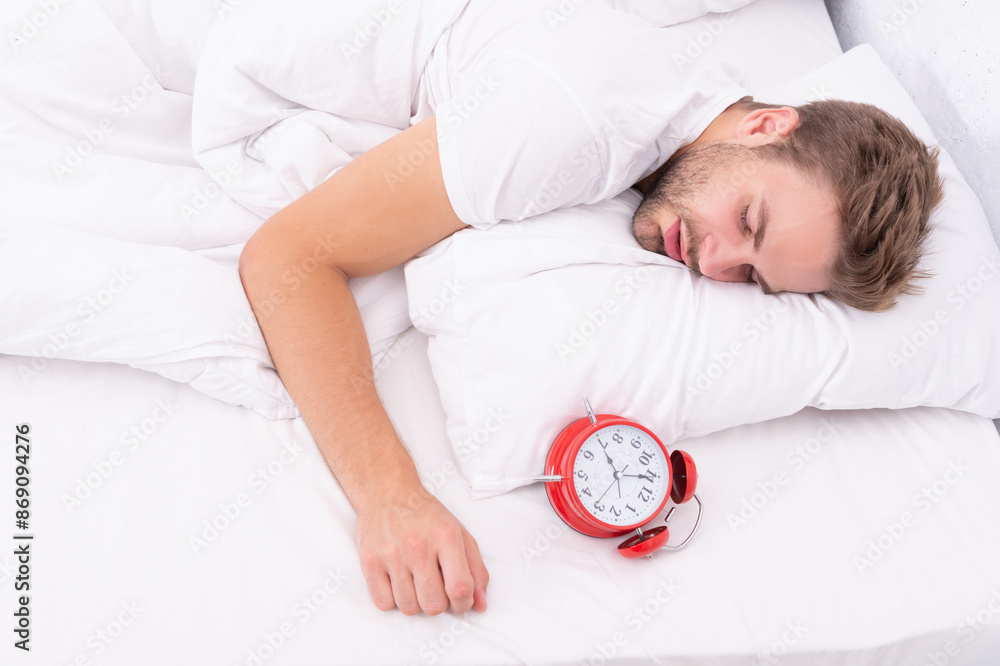 Waking up early. Time to wakeup and get up. Morning wakeup. Sleepy man ...