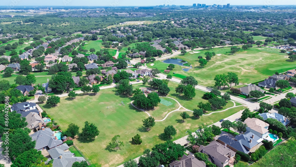 Upscale residential neighborhood urban sprawl lush greenery area with ...