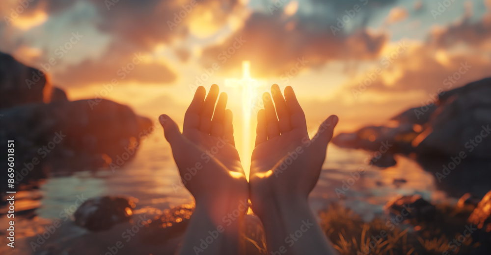 Cupped hands reaching towards the sky with an illuminated cross rosary ...