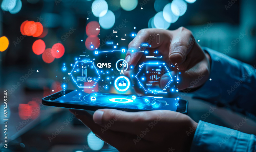 Professional utilizing digital interface to manage Quality Management ...