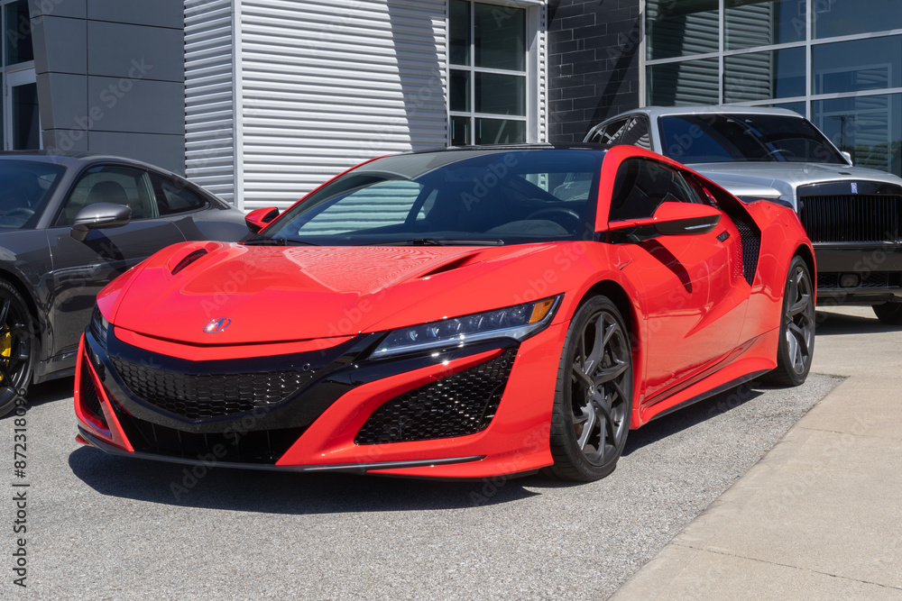 Acura NSX display at a dealership. Acura offers the NSX with a 573HP ...