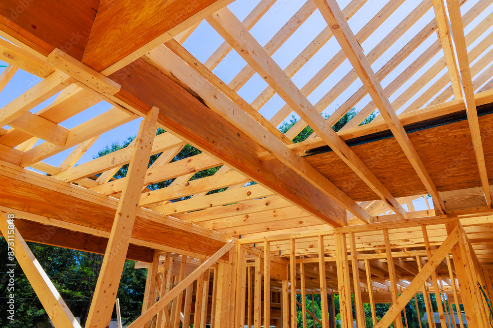 Building of wooden roof beams from trusses rafters with joists Stock ...