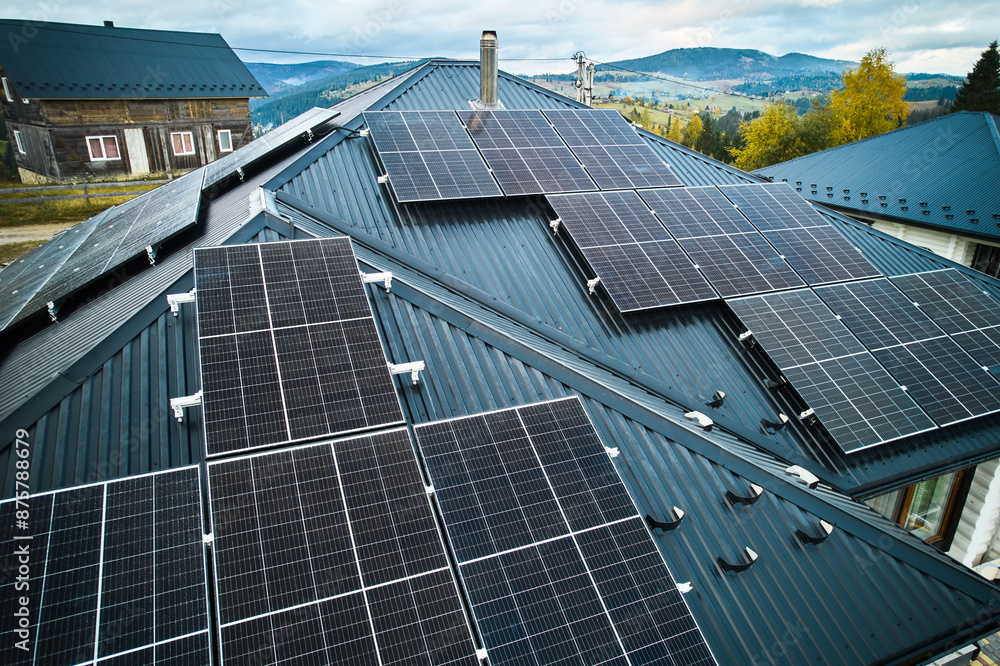 Photovoltaic solar panel system on the roof of house. Modern solar ...