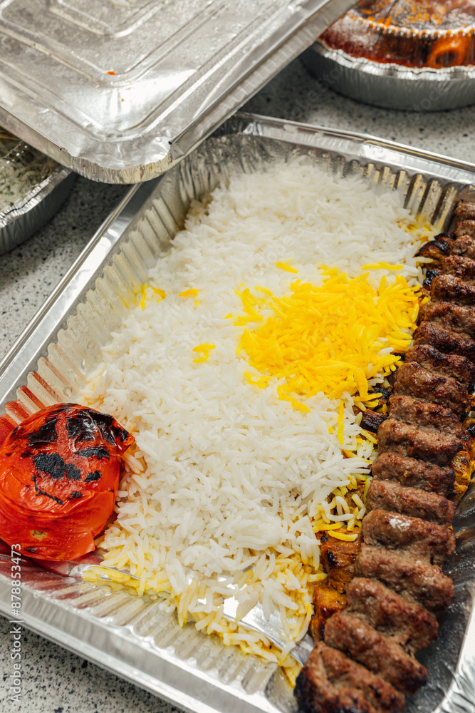 takeout platter of Persian food: basmati rice sprinkled with saffron ...