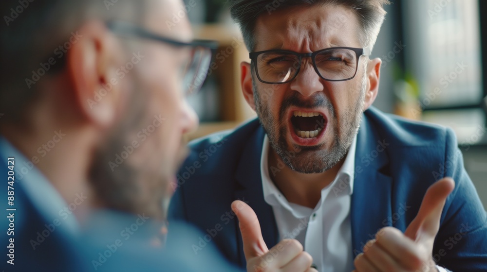 Businessman in a suit yelling with clenched fists and thumbs up in an ...