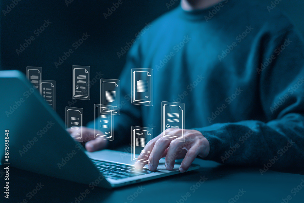 manages document data on a laptop. concept of document files digital ...