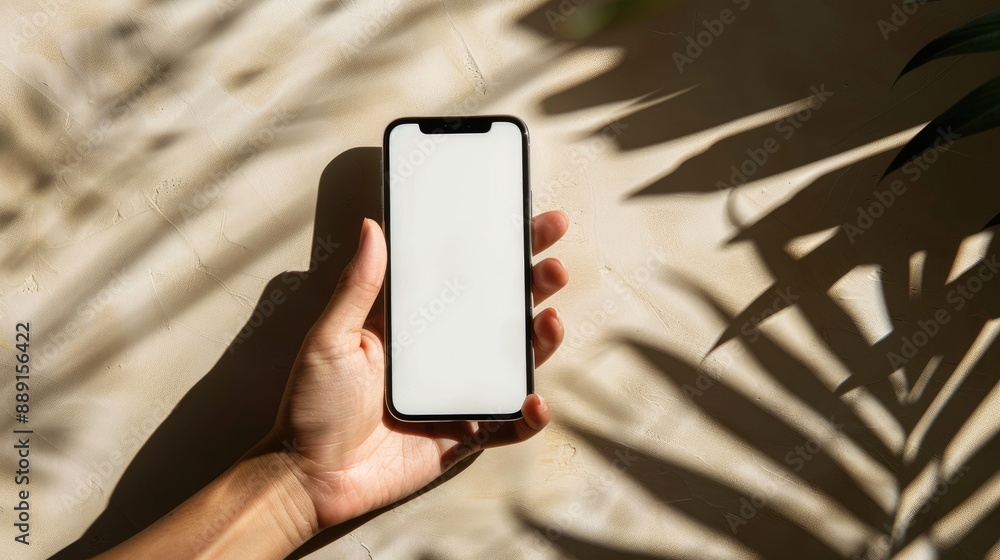 hand holding smartphone with white screen mockup for wallpapers Stock ...