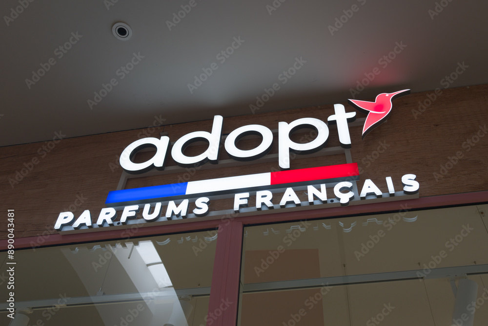 adopt parfum francais sign text store and logo brand shop on facade ...