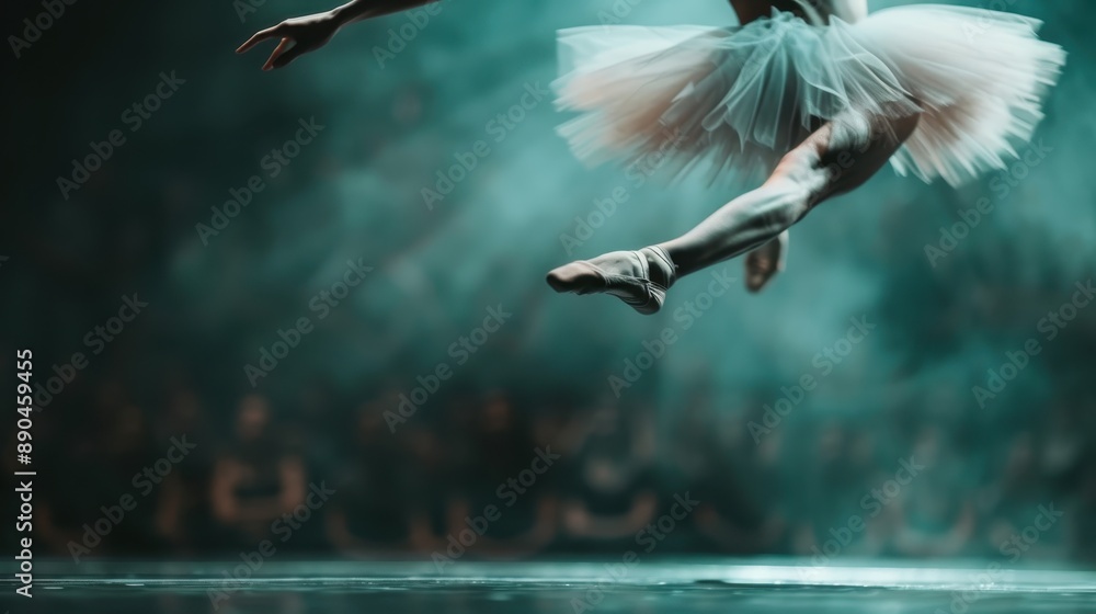 This stunning action shot captures a ballet dancer mid-leap, performing ...