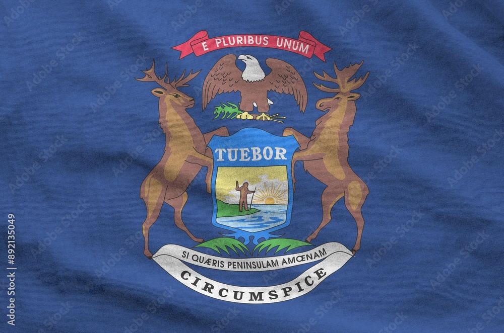 Michigan US state flag depicted on folded wavy fabric of old cloth ...