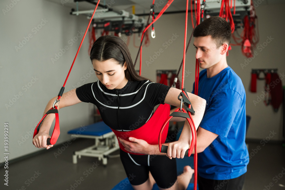 Supervised red cord physiotherapy at rehabilitation center. Pain-free ...