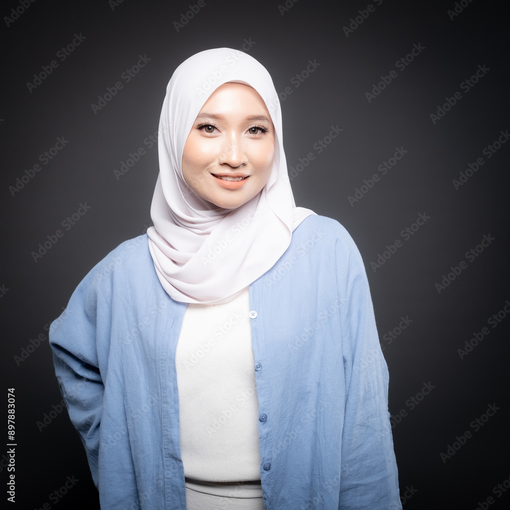 Portrait of a beautiful Malaysian and Indonesian Muslim young women wearing modern and casual ...