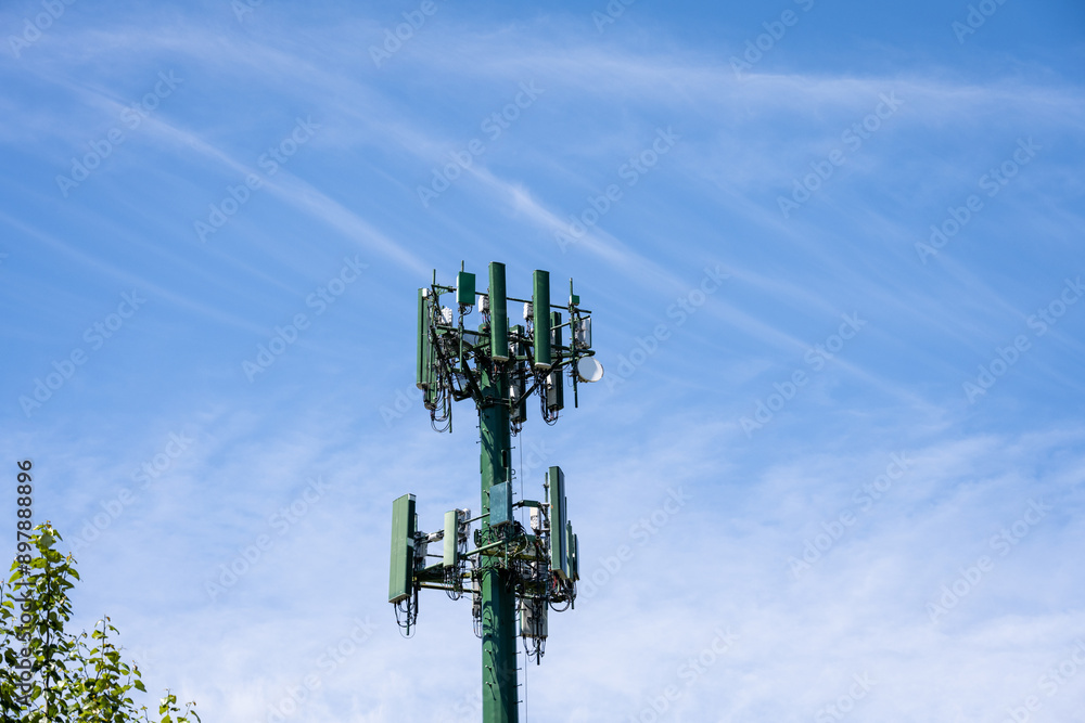 Mobile telecommunications cell site with monopole tower and antennas ...