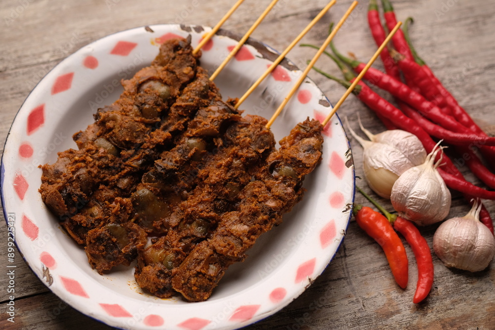 Clam Satay. Sate Kerang. Made from clams, chili, garlic, salt, spices ...