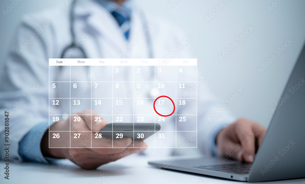 Medical worker with virtual digital calendar on laptop for plan ...