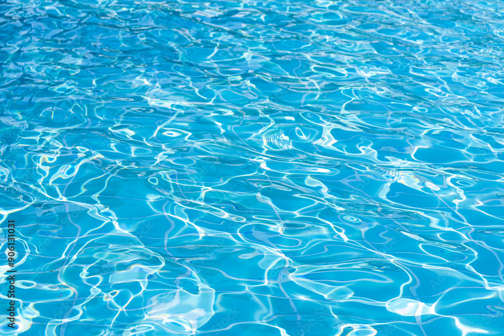 Blue swimming pool water surface and ripple wave background. Summer ...
