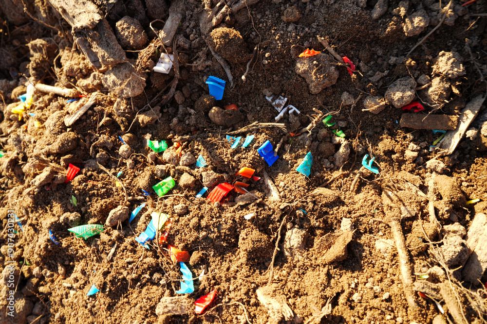 Foto de Stock Microplastic pollution. Microplastics in ground. Soil ...
