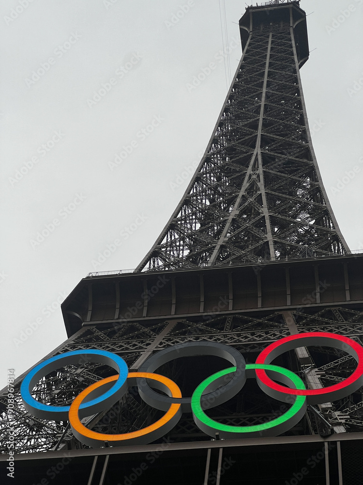 The Eiffel Tower decorated with the Olympic rings, the famous logo ...