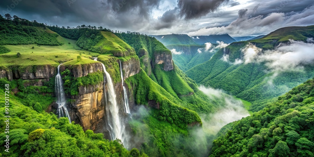 Lush green landscape in Cherrapunji, India with cascading waterfalls ...