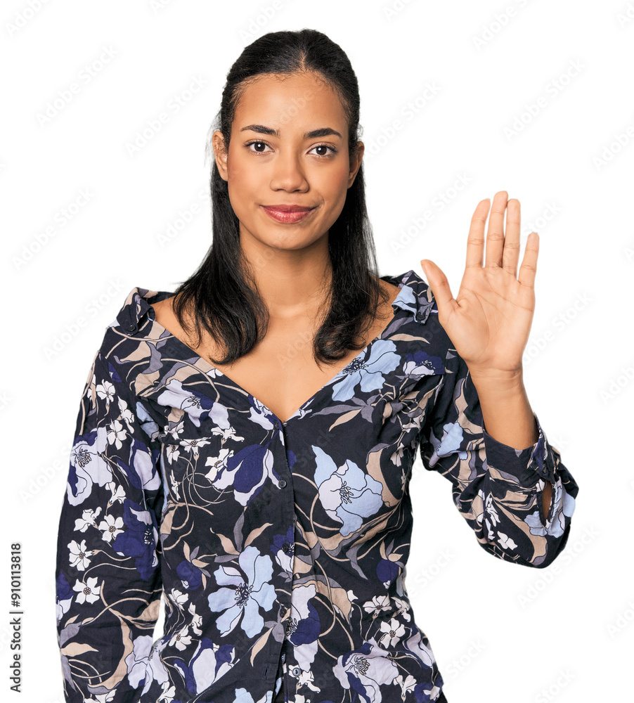 Young Filipino woman in studio smiling cheerful showing number five ...