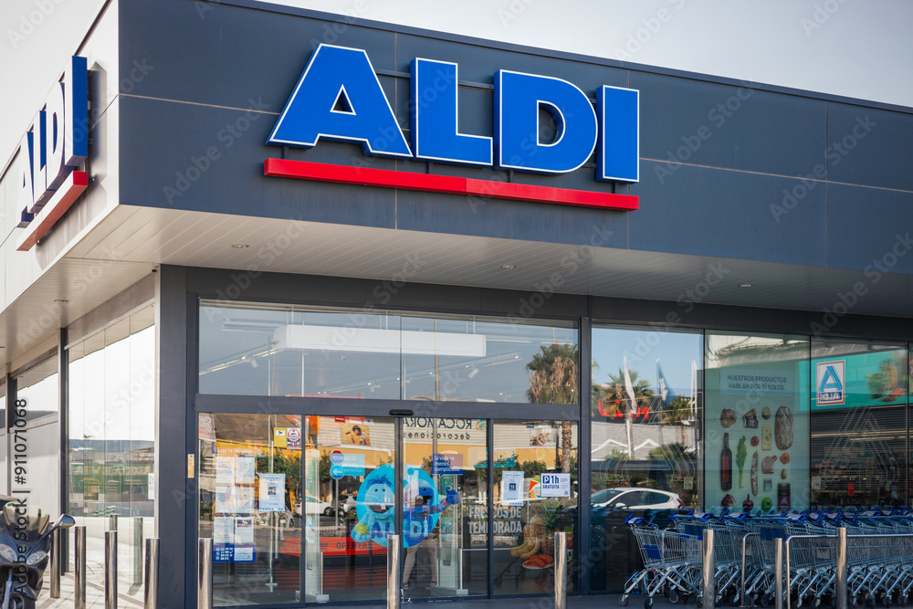 Exterior of an ALDI store. The storefront is visible with clear glass ...