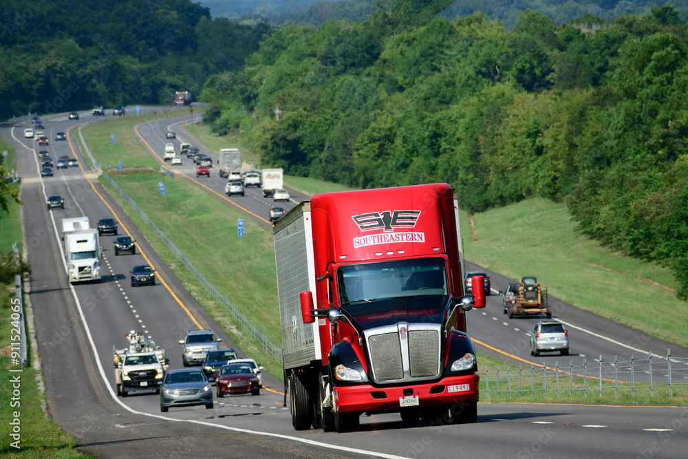 Red Kenworth Eighteen-Wheeler Leads Traffic In Tennessee Stock Photo ...