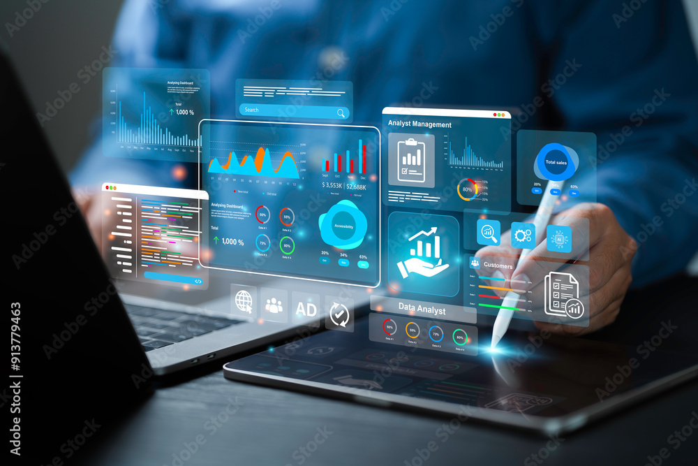 An analyst uses a computer and dashboard for data business analysis and ... An analyst uses a computer and dashboard for data business analysis and ...