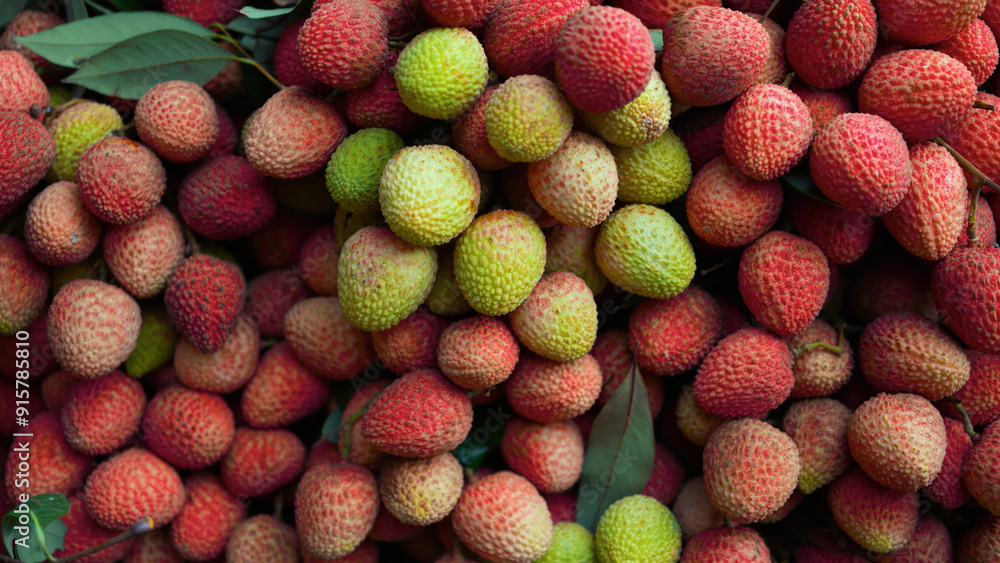 Freshly picked ripe lychees, ready for sale at the market. Vibrant ...