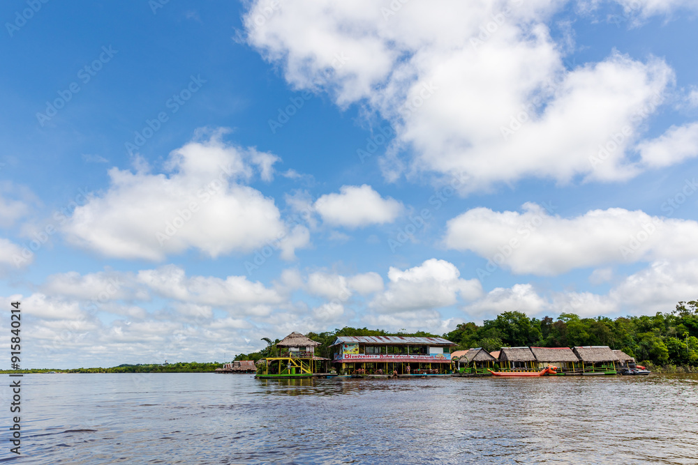 Foto de Stock Navigating the Amazon River. In the Amazon jungle, near ...