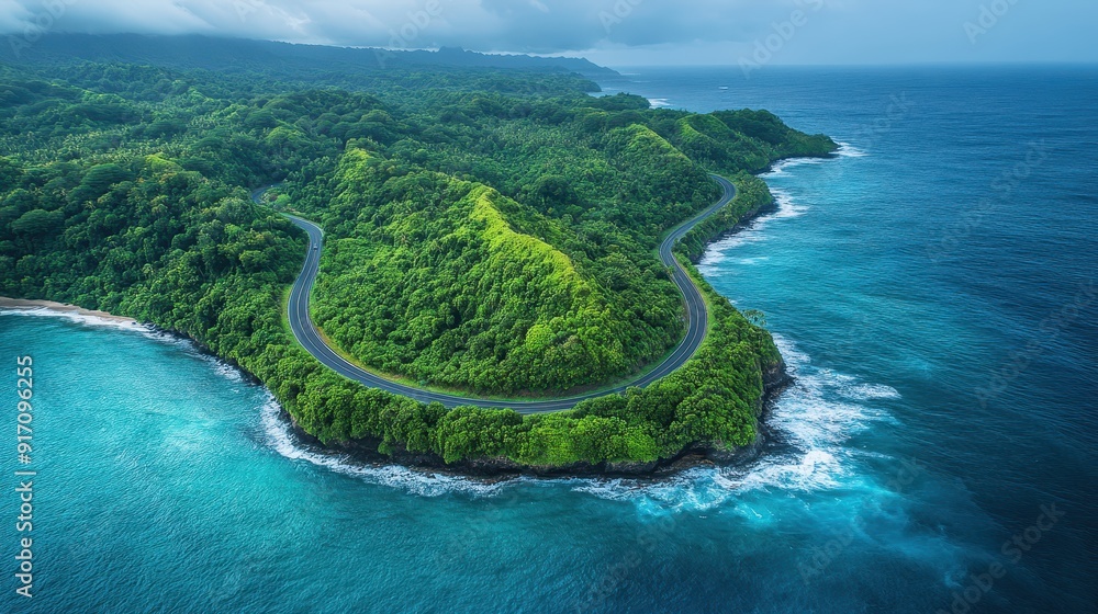 Aerial View of Winding Coastal Road with Green Forest and Ocean Waves ...