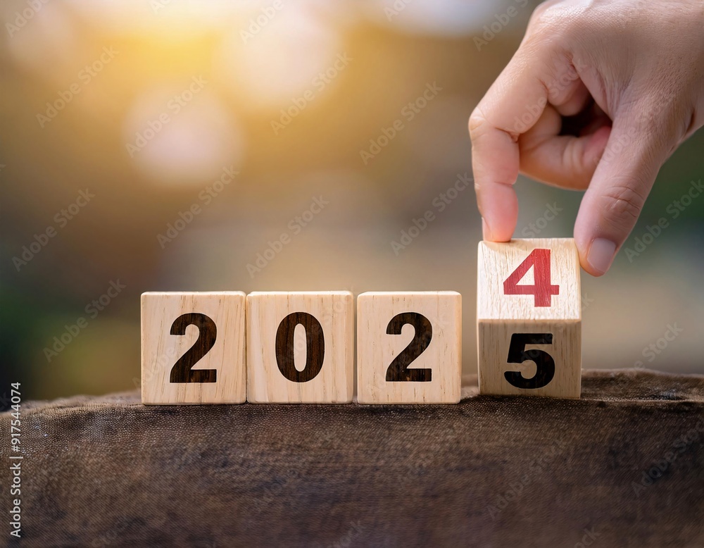 business growth in 2025 using wooden blocks. The wooden block shows the ...