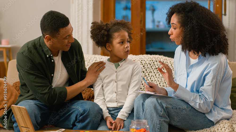African American doctor speech therapist teaching treat child ...