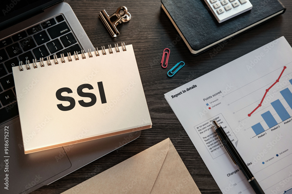 There is notebook with the word SSI. It is an abbreviation for Self ...