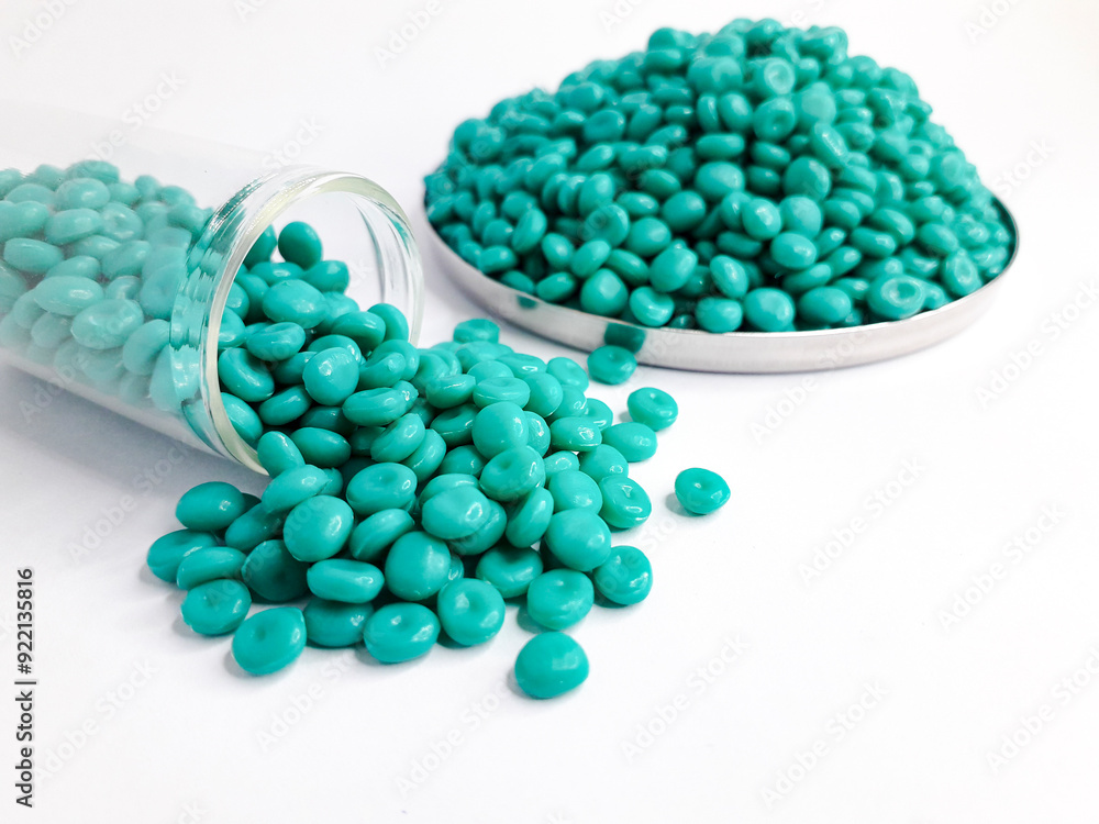 Aruba blue masterbatch granules on white background. Color pigment ...