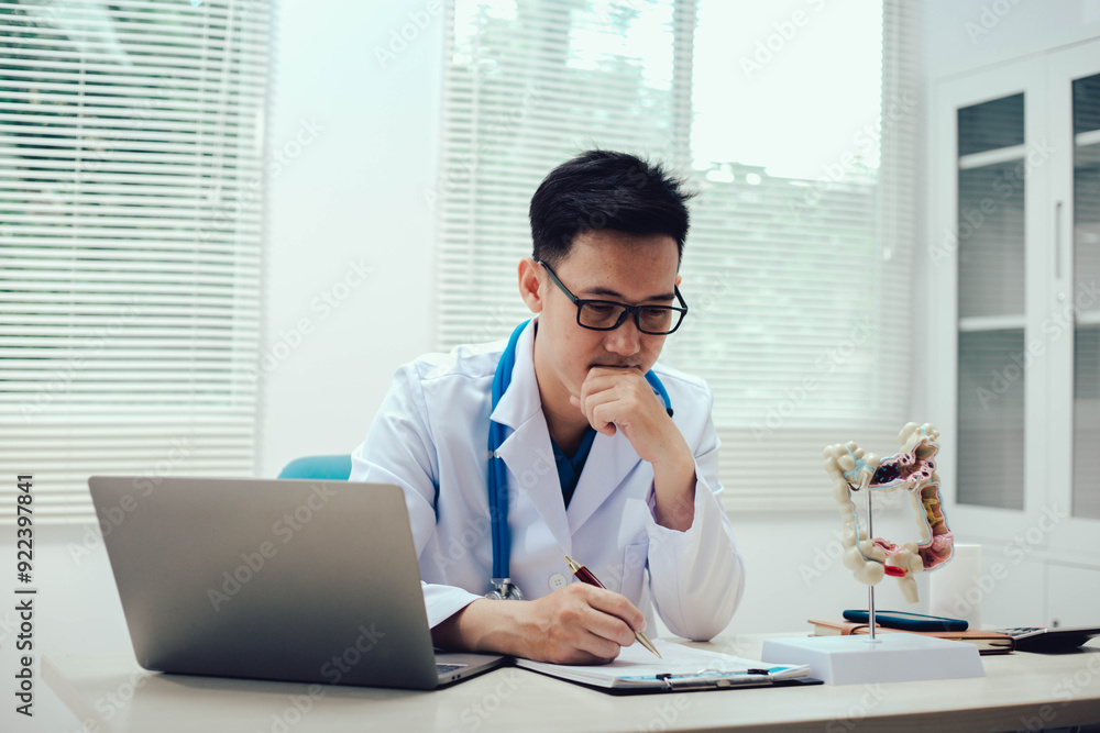 The intestine, comprising the small and large intestines, is a long ...