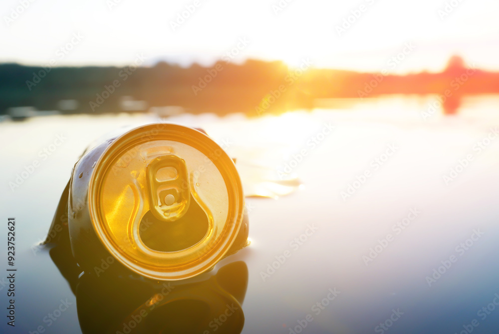 Foto de Stock Beer can waste in lake. Empty metal soda can garbage ...