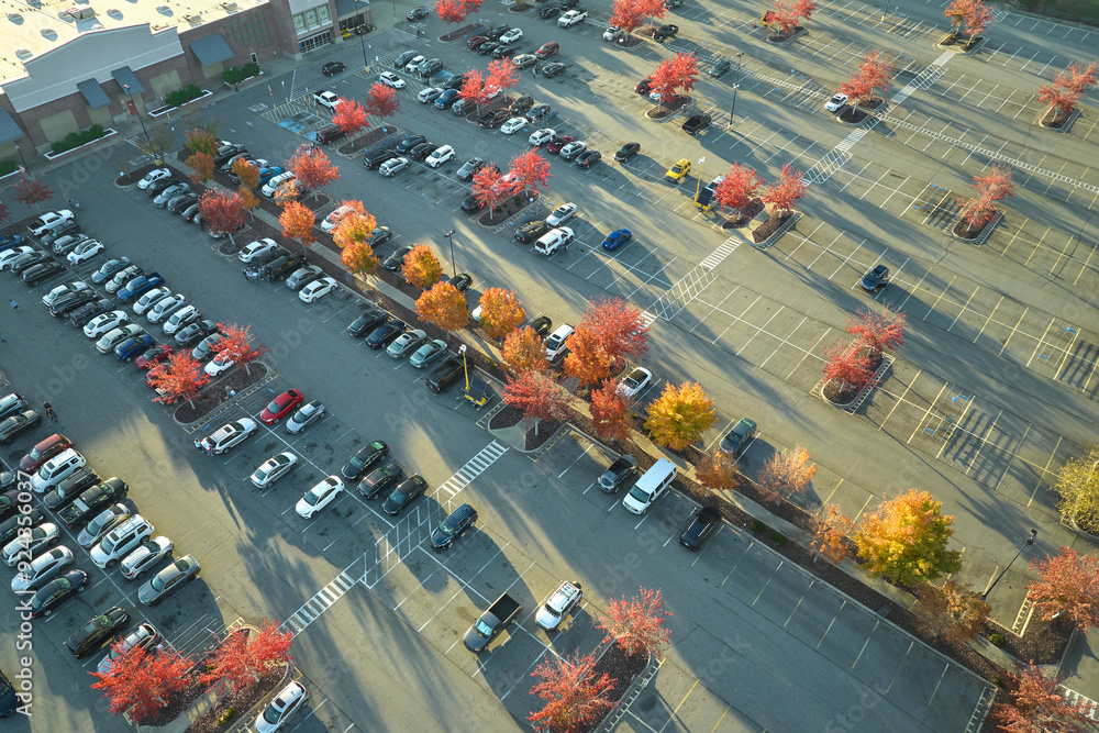 View from above of american grocery store with many parked cars on ...