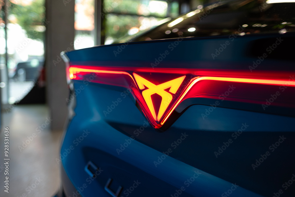 rear view fully electric Cupra Tavascan, logo, Spanish compact ...