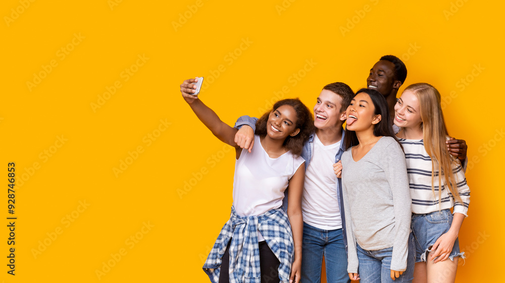 Nice time together. Cheerful group of multiethnic friends taking selfie ...