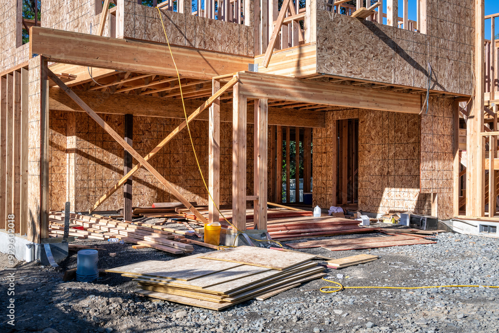 Summer construction season, two story new house build in progress at ...