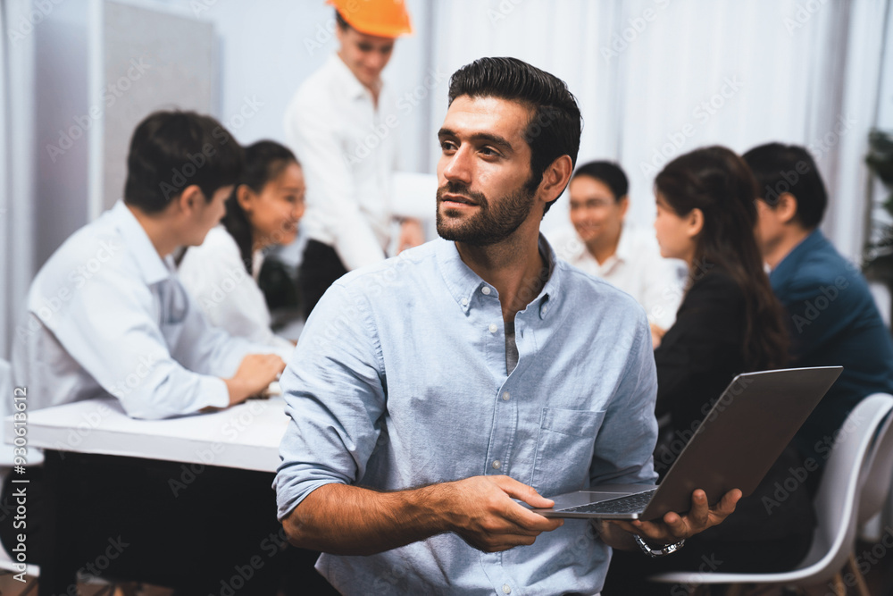 Engineer team leader portrait with diverse group of civil engineer and ...