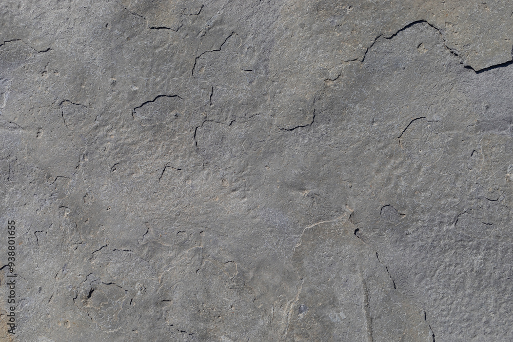 Rocks worn by wind and sea found on a wild beach, which is part of a ...